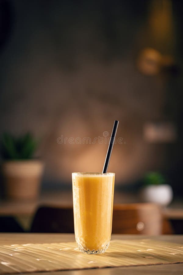 Refreshing yellow smoothie stock photo. Image of healthy - 325782018