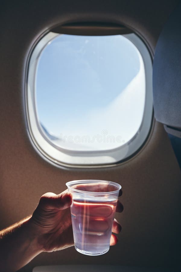 Refreshment during flight stock photo. Image of cabin - 160721486