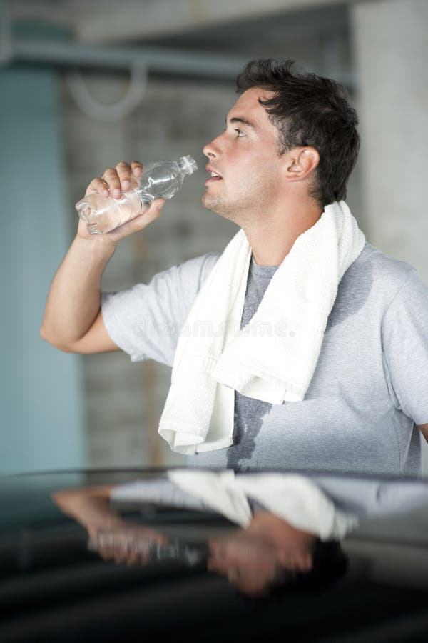 Refreshment after Sport Training Stock Photo - Image of sweat, male ...