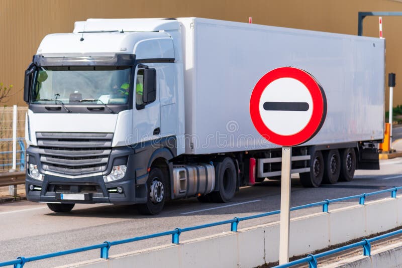 Refrigerated Truck Passing through a Border, Traffic Sign Warning of ...