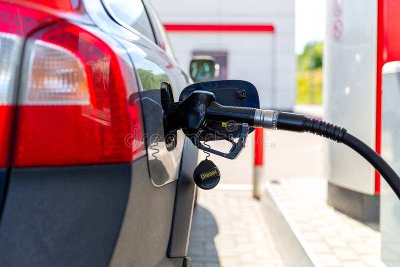 The Refueling Gun is Inserted into the Fuel Tank Stock Photo - Image of ...