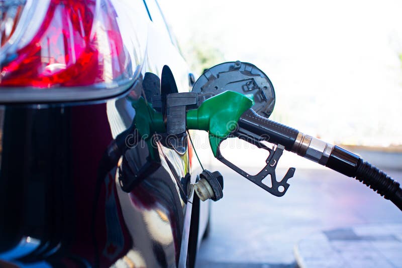 Refueling Gun in the Tank at the Gas Station Stock Photo - Image of ...