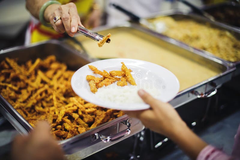 Refugees` Hands are Receiving Food from Philanthropists: the Concept of ...