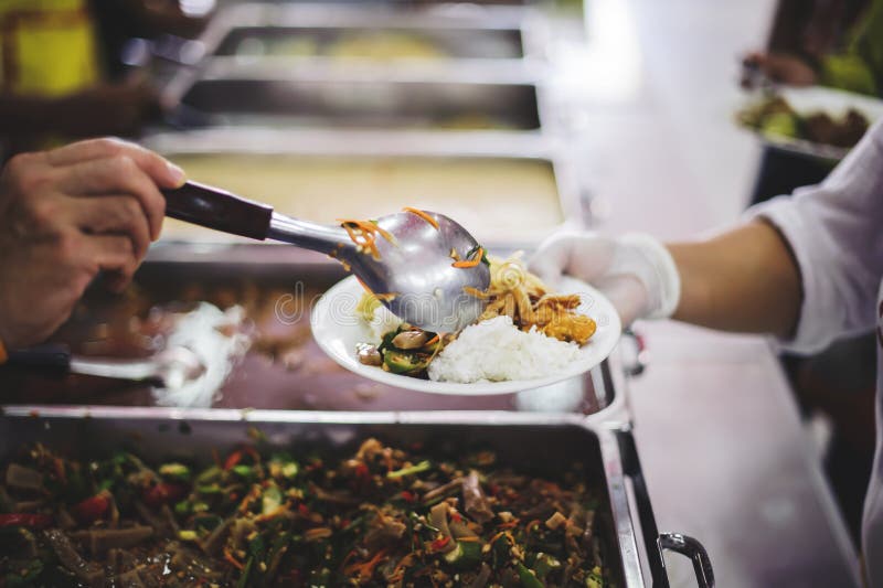 Refugees` Hands are Receiving Food from Philanthropists: the Concept of ...