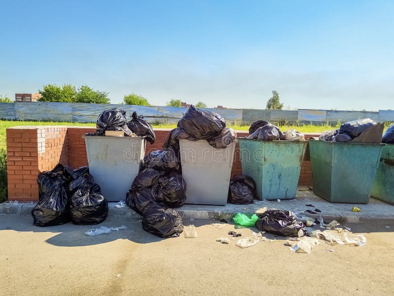 Refuse Bins Full of Garbage Bags Stock Photo - Image of dumpster ...
