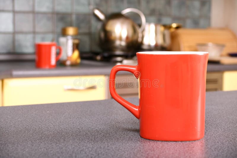 Reg Mug on Kitchen Counter stock image. Image of drawers - 3297745