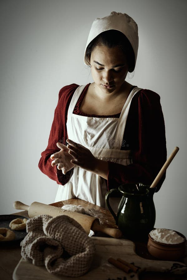 A Regency Working-class Woman or Servant Preparing Food Stock Image ...