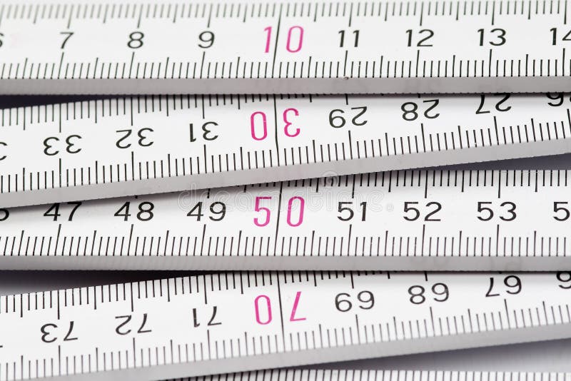 Regla De Metro En Negro Formado a Cuadrado Imagen de archivo - Imagen ...