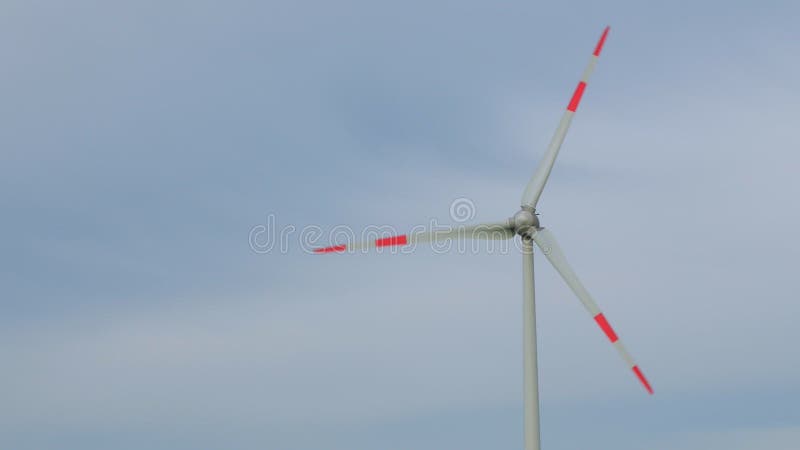 Regular Wind Turbines Rotating in the Wind on an Blue Sky. Stock ...