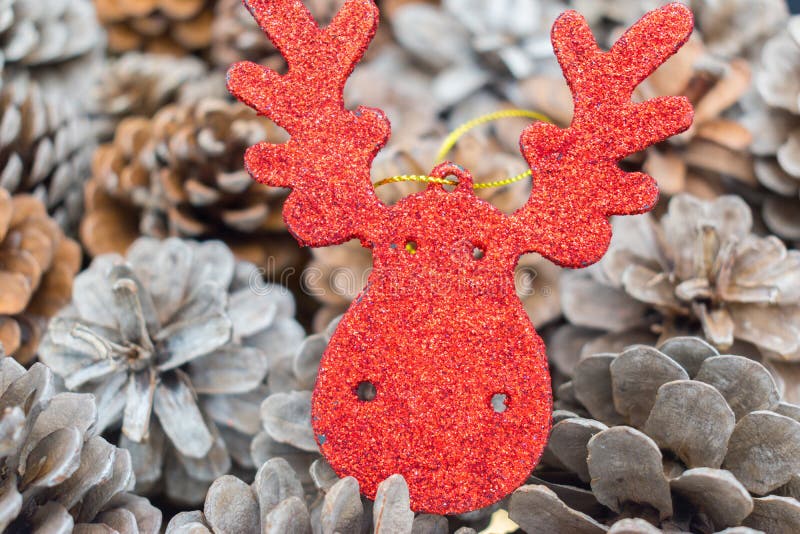 Reindeer Head Decoration between Pinecones. Stock Image - Image of ...