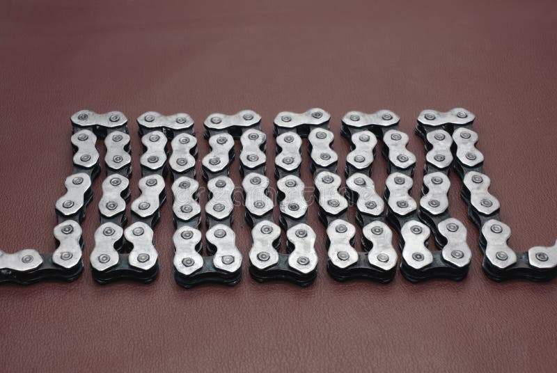 Reinforced Bicycle Chain Close-up on a Brown Background Stock Photo ...