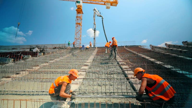 Building Construction. Working Process at a Construction Site. Builders ...