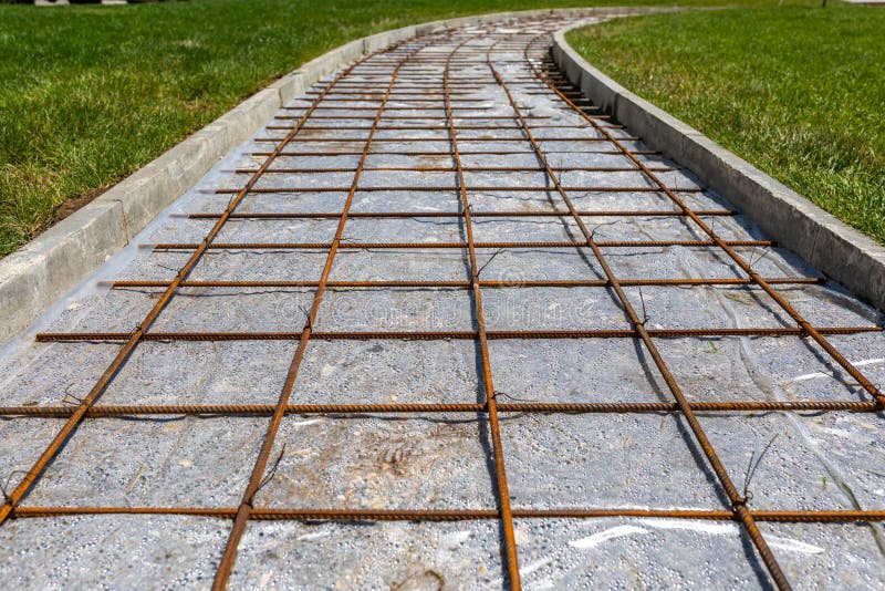 The Construction Stage of a Pedestrian Path in the Park. Steel Rods ...