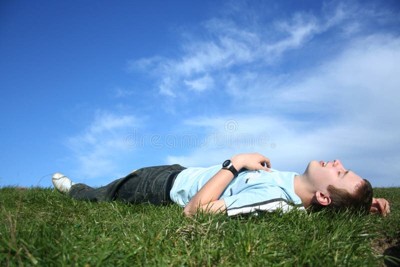 Couple lying on grass stock photo. Image of relax, support - 302174