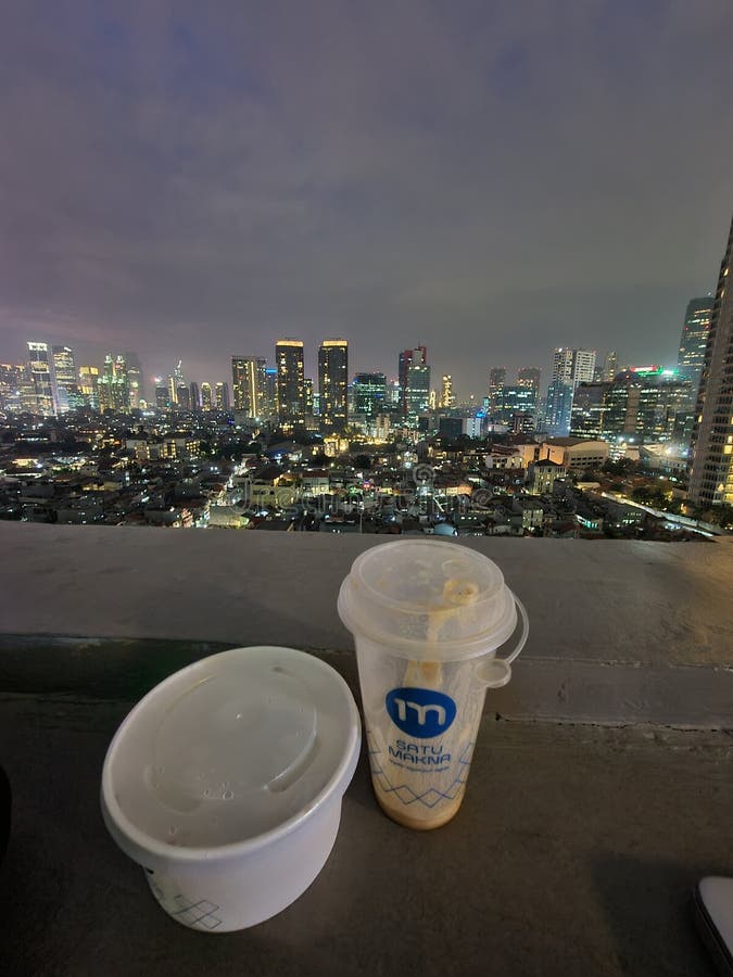 Relax in the Cafe while Enjoying the View of the Night City Editorial ...