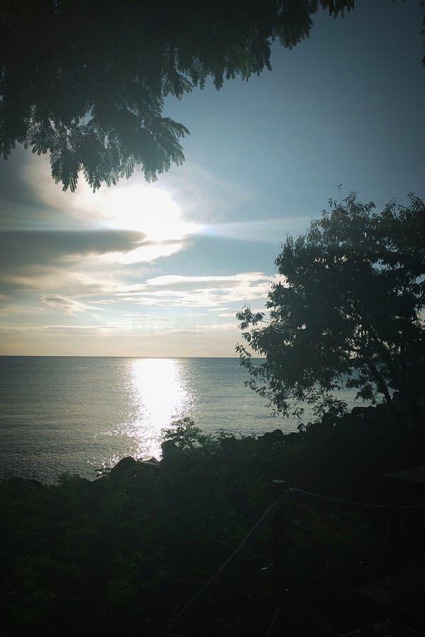 Relax for a Moment by Enjoying the View on the Beach Stock Photo ...