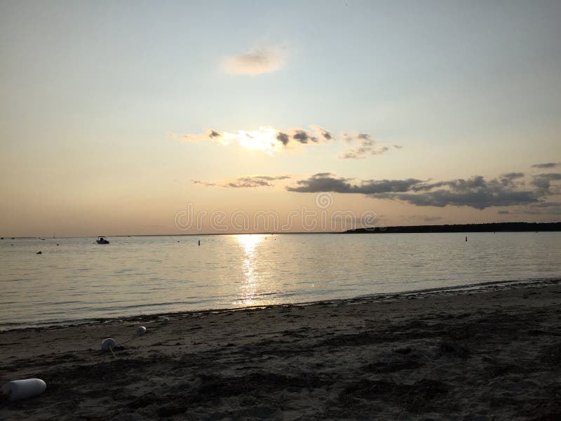 Beach sunset stock photo. Image of sunset, beach, unwind - 173899136