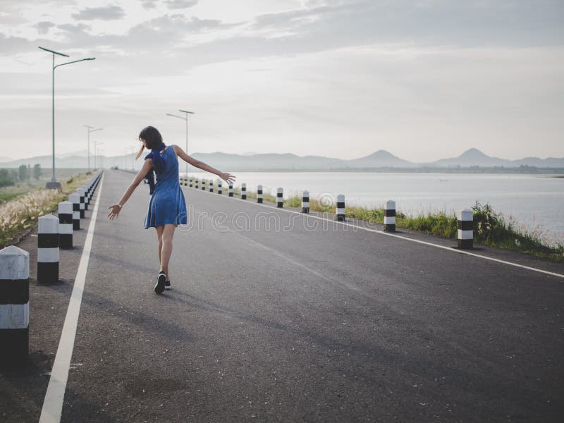Relax woman on the road stock photo. Image of outdoor - 92031690