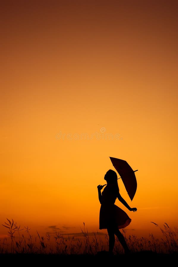 Relax Woman Standing and Sunset Silhouette Stock Image - Image of black ...