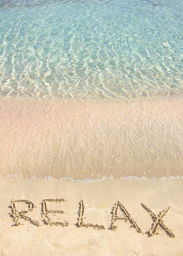 Relax Word Written in the Sand, on a Beautiful Beach with Clear Blue ...
