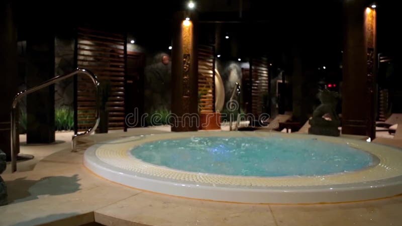 Relaxation Pool in Spa with Waterfall. Empty Luxury Spa with Jacuzzi ...