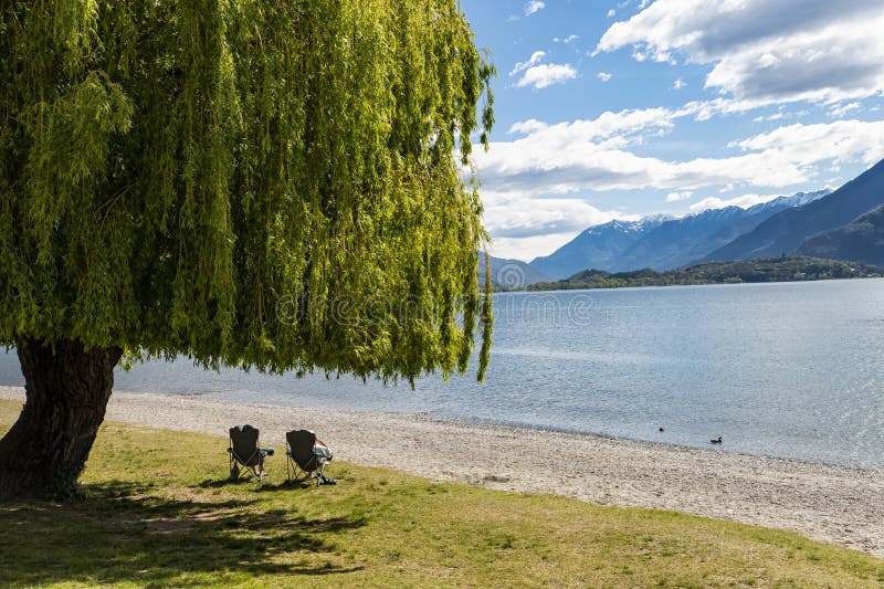 Relaxation Scene on a Beach of Lake Como Stock Image - Image of beach ...