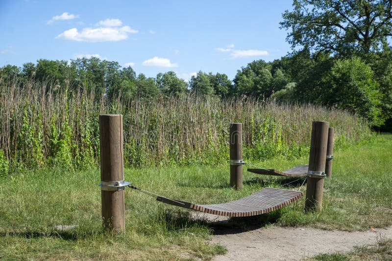 Relaxation Spot in Nature with Wooden Hammock Stock Photo - Image of ...