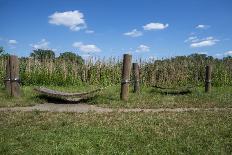 Relaxation Spot in Nature with Wooden Hammock Stock Photo - Image of ...