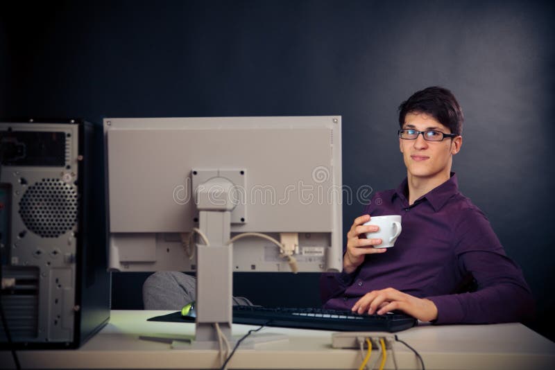 Relaxed Admin at His Desk stock photo. Image of working - 85457494