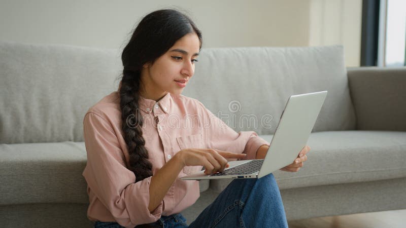Relaxed Arabian Woman Student Sit on Floor at Home Working with ...