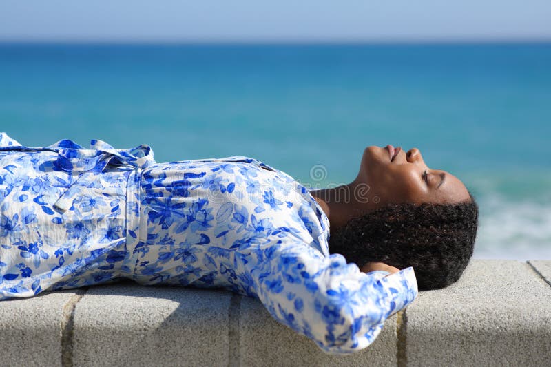 Relaxed Black Woman Lying on the Beach Resting Stock Image - Image of ...