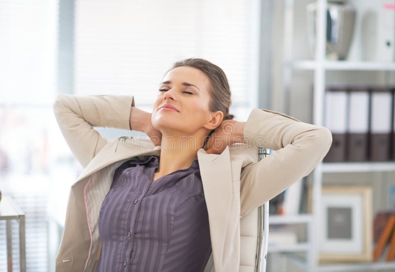 Relaxed Business Woman in Office Stock Photo - Image of businesswoman ...