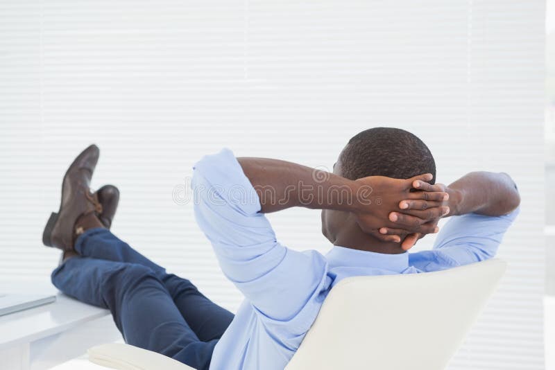 Relaxed Businessman with His Feet Up Stock Photo - Image of indoors ...