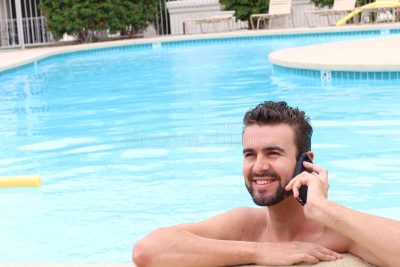 Relaxed Businessman Using Phone by Swimming Pool Stock Photo - Image of ...