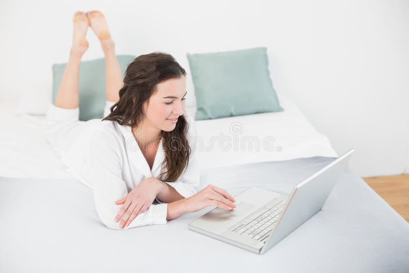 Relaxed Casual Brunette Using Laptop in Bed Stock Image - Image of ...