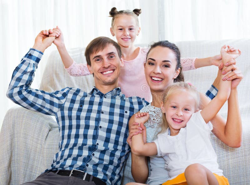 Relaxed Family in Domestic Interior Stock Image - Image of parenting ...