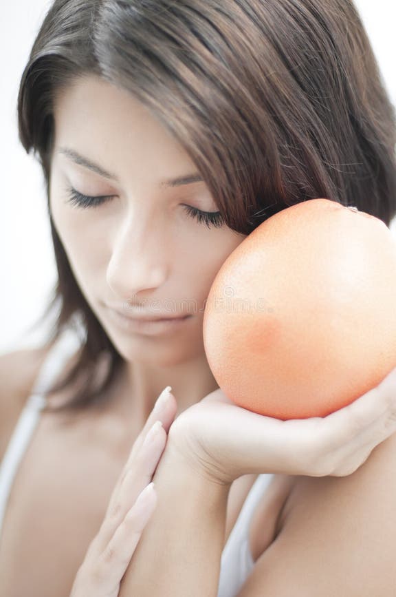 Relaxed Girl with Orange Fruit Stock Image - Image of citrus, adult ...