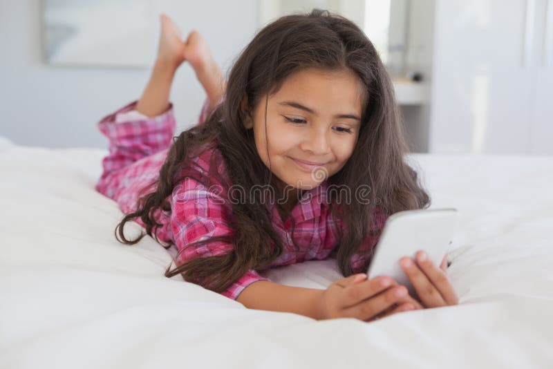 Relaxed Girl Text Messaging in Bed Stock Image - Image of childhood ...