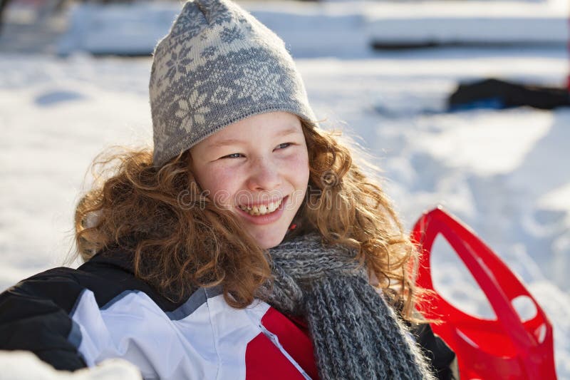 Relaxed Girl in Winter Cloths with Red Sledge Stock Photo - Image of ...