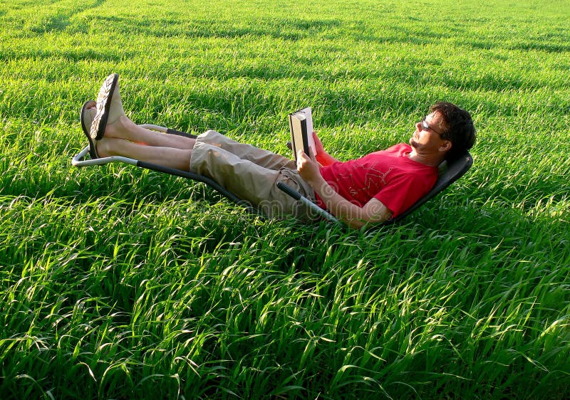 Relaxed Holiday Reading stock image. Image of natural - 9810347