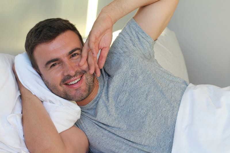 Relaxed Looking Male Cozy in Bed Stock Image - Image of flamboyant ...