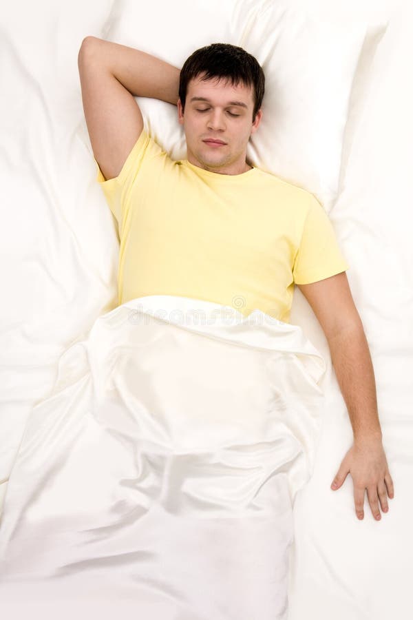 Relaxed man stock photo. Image of asleep, bedding, angle - 8341526