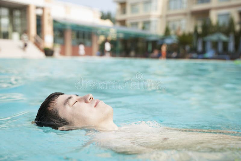 Floating in pool stock image. Image of person, sunbathing - 732025