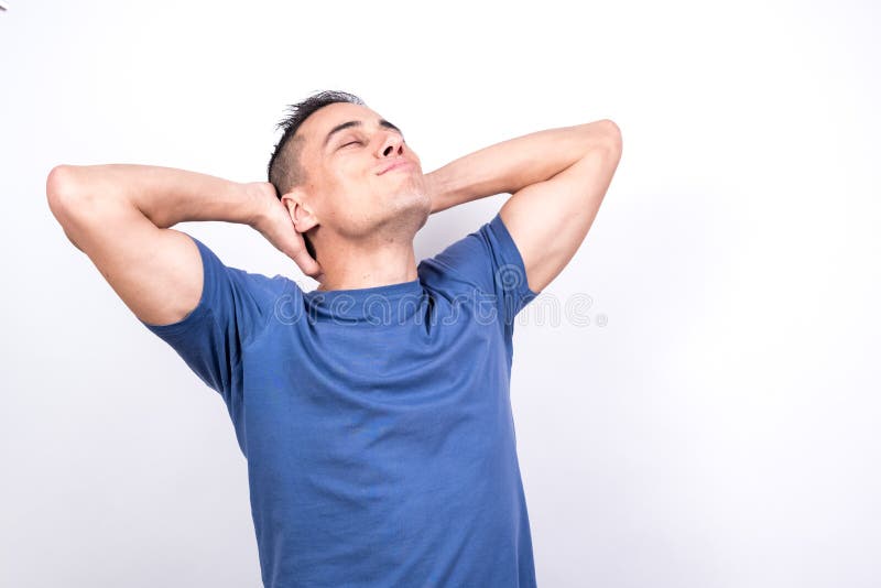 Relaxed Man Leaning Back with His Hands on the Back of His Neck Stock ...