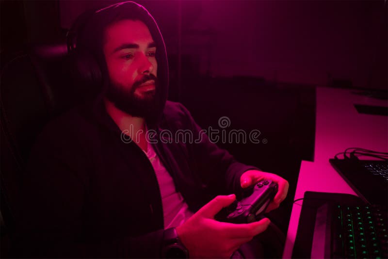 Relaxed Man Playing Video Game Stock Photo - Image of championship ...