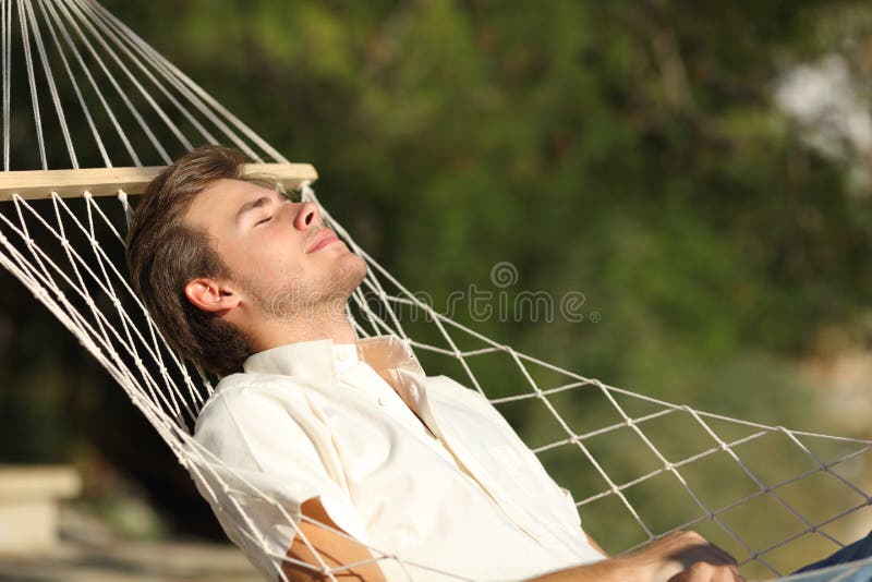 Relaxed Man Resting Lying on a Hammock Outdoors Stock Image - Image of ...