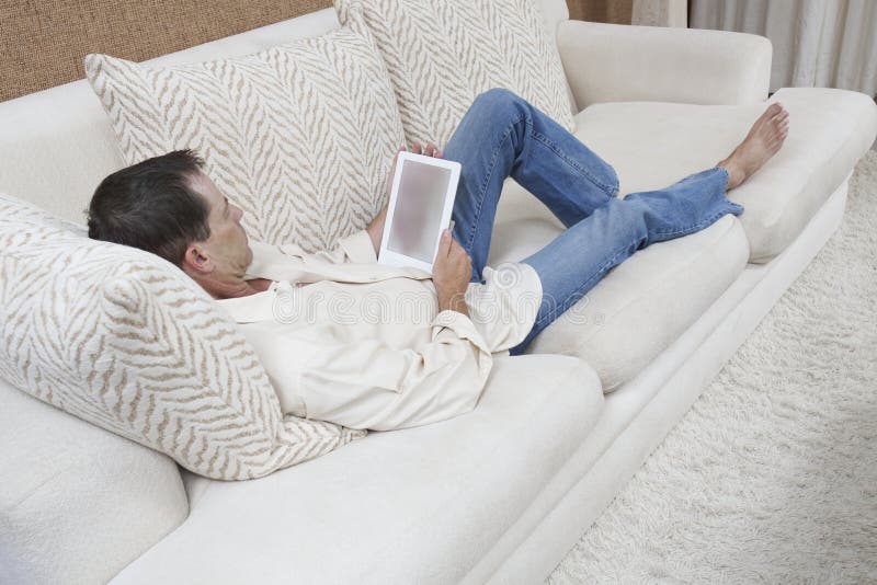 Relaxed Man Using Digital Tablet Stock Image - Image of digital ...