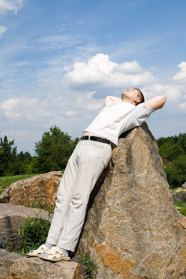 Relaxed men stock photo. Image of risen, rock, back, dark - 2713798