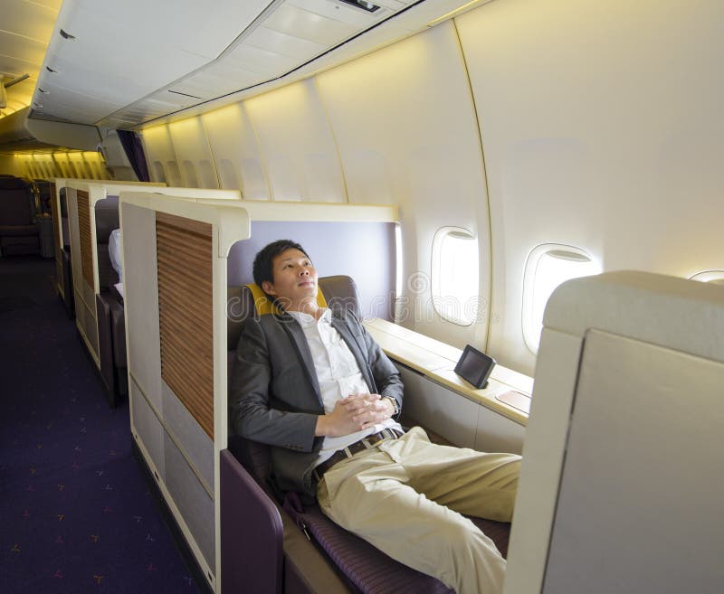 Relaxed Mid Adult Business Man Sleeping in First Class Seat Stock Image ...