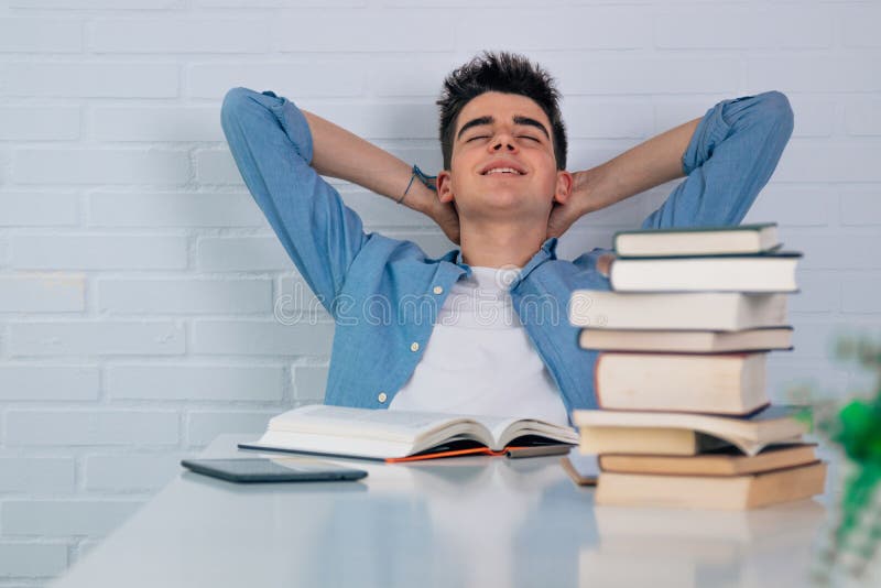 Relaxed Student at the Desk Stock Image - Image of sleep, books: 226701391